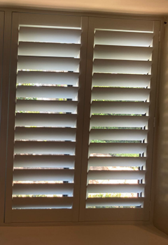 Elevate Your Living Room in Brea with Elegant White Plantation Shutters by Yorba Linda Blinds ...